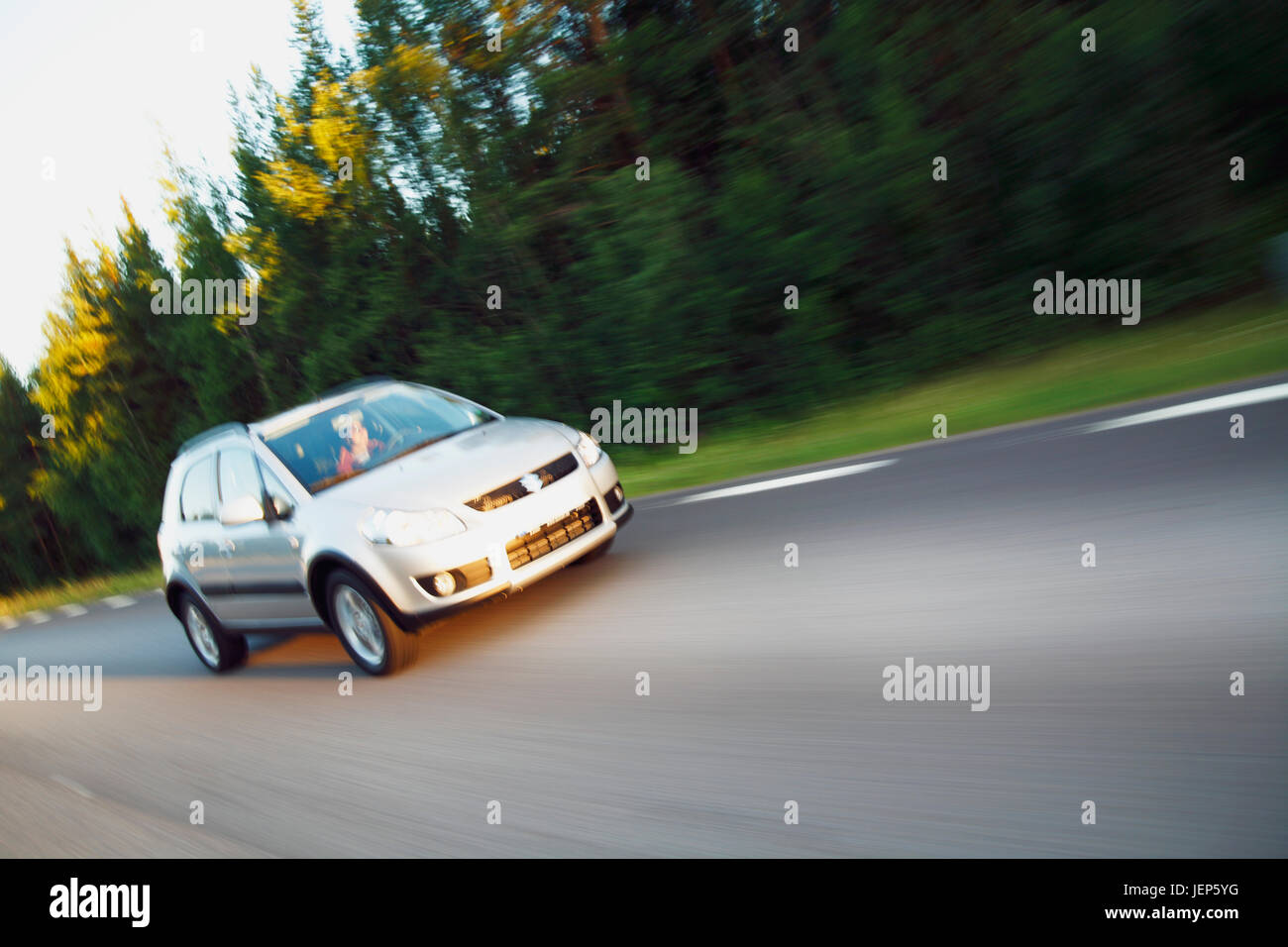 Car on country road Stock Photo - Alamy