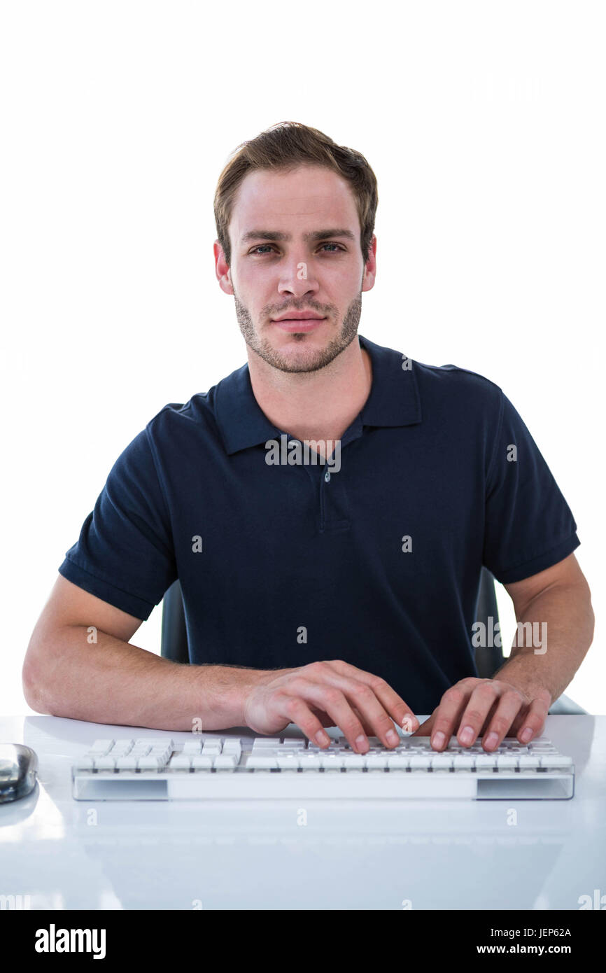 Handsome man using computer Stock Photo - Alamy