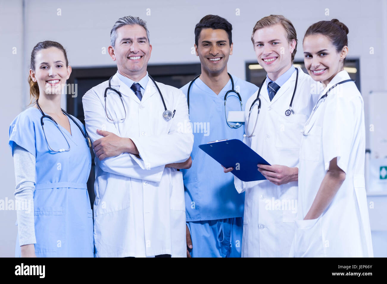Portrait of medical team standing together Stock Photo - Alamy