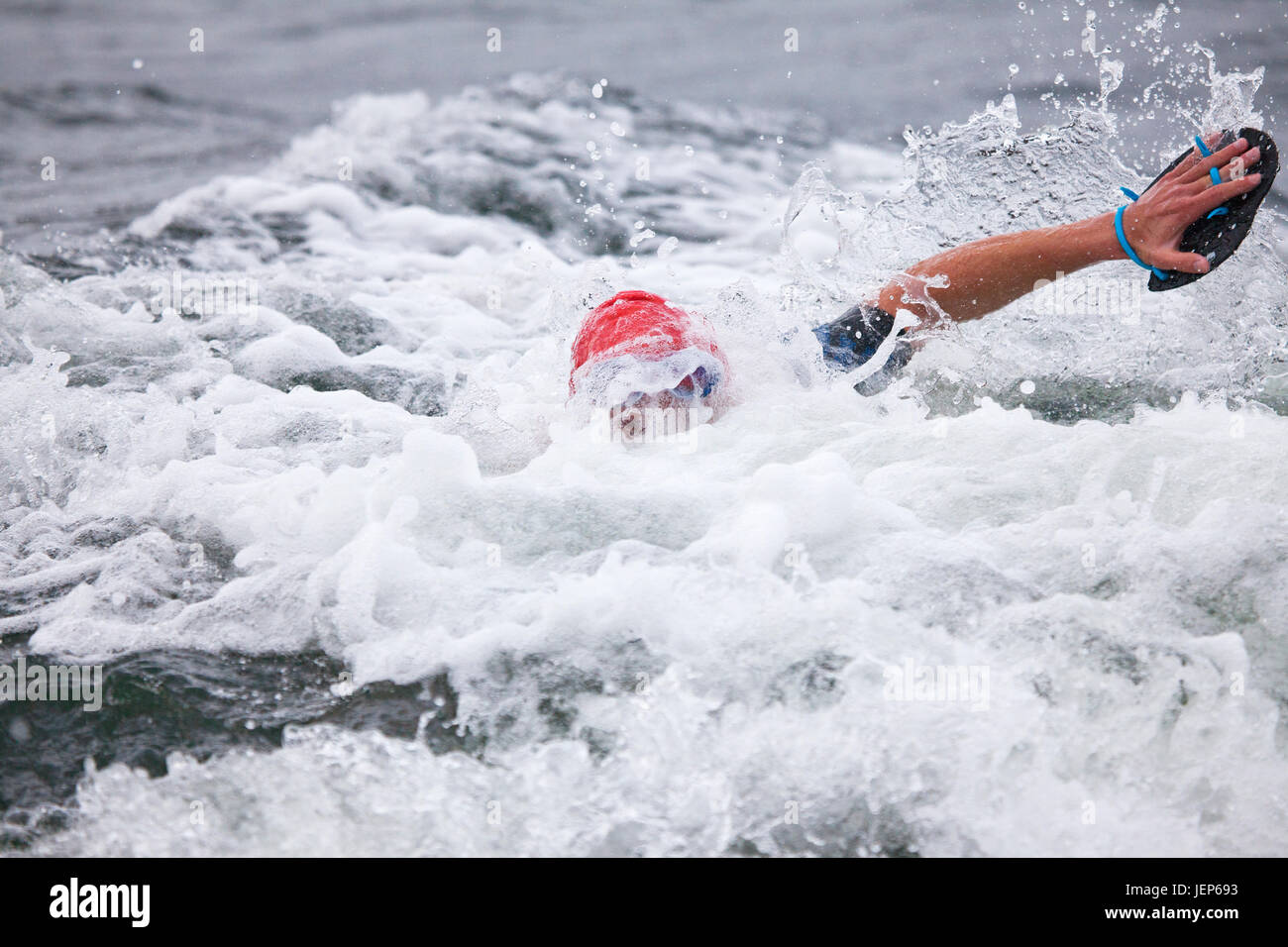 Person swimming in river Stock Photo - Alamy
