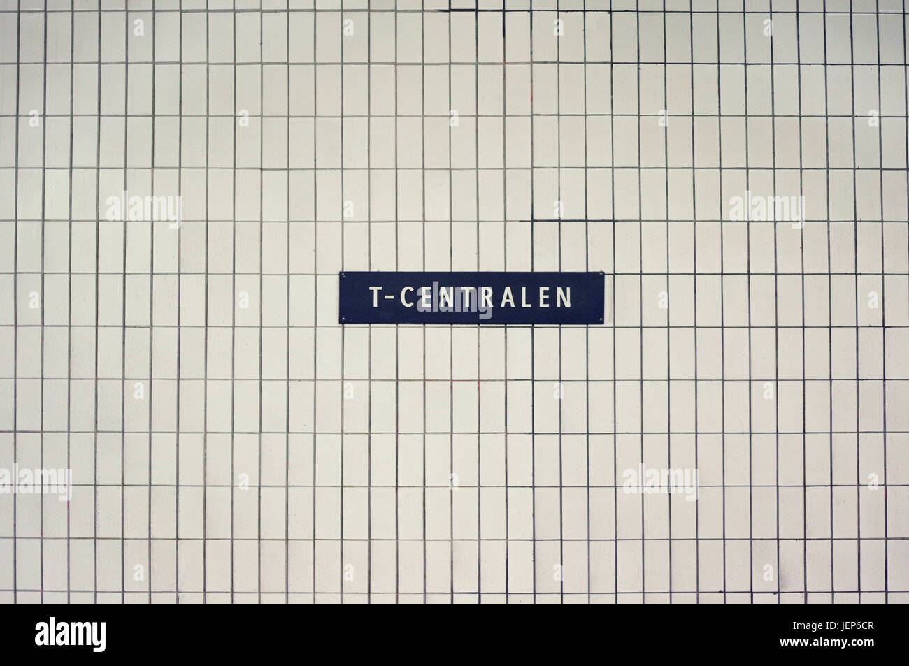Sign on tiled wall Stock Photo - Alamy