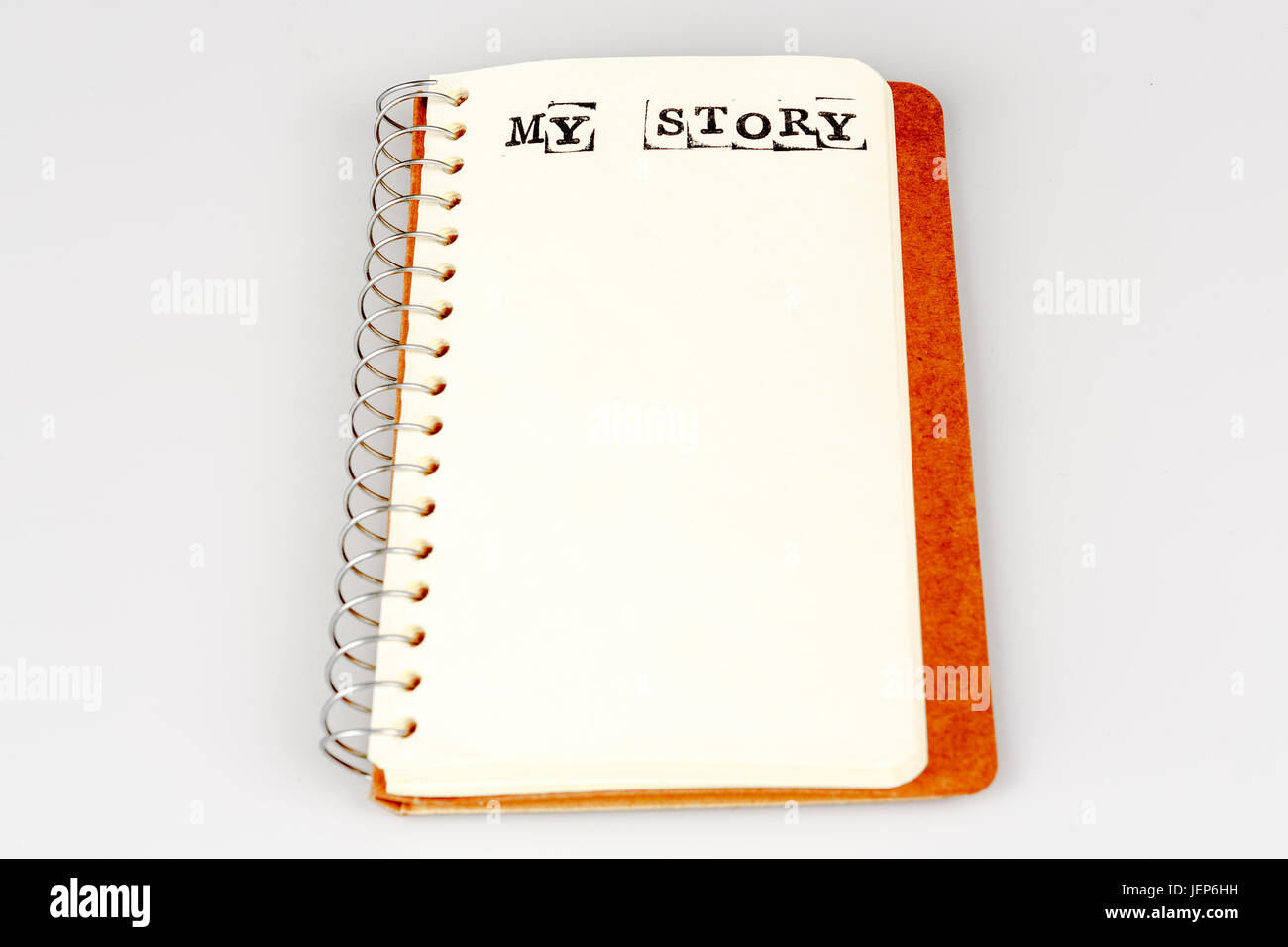 My story book on the white, Diary with text Stock Photo - Alamy