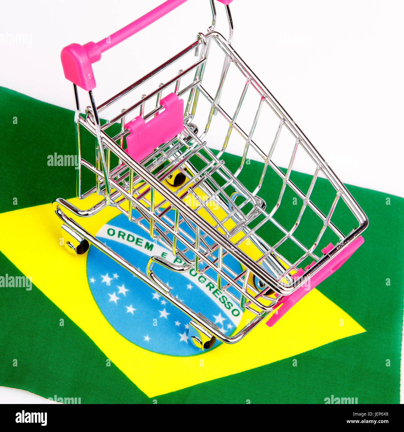 pink shopping cart on brazil flag - white background Stock Photo - Alamy