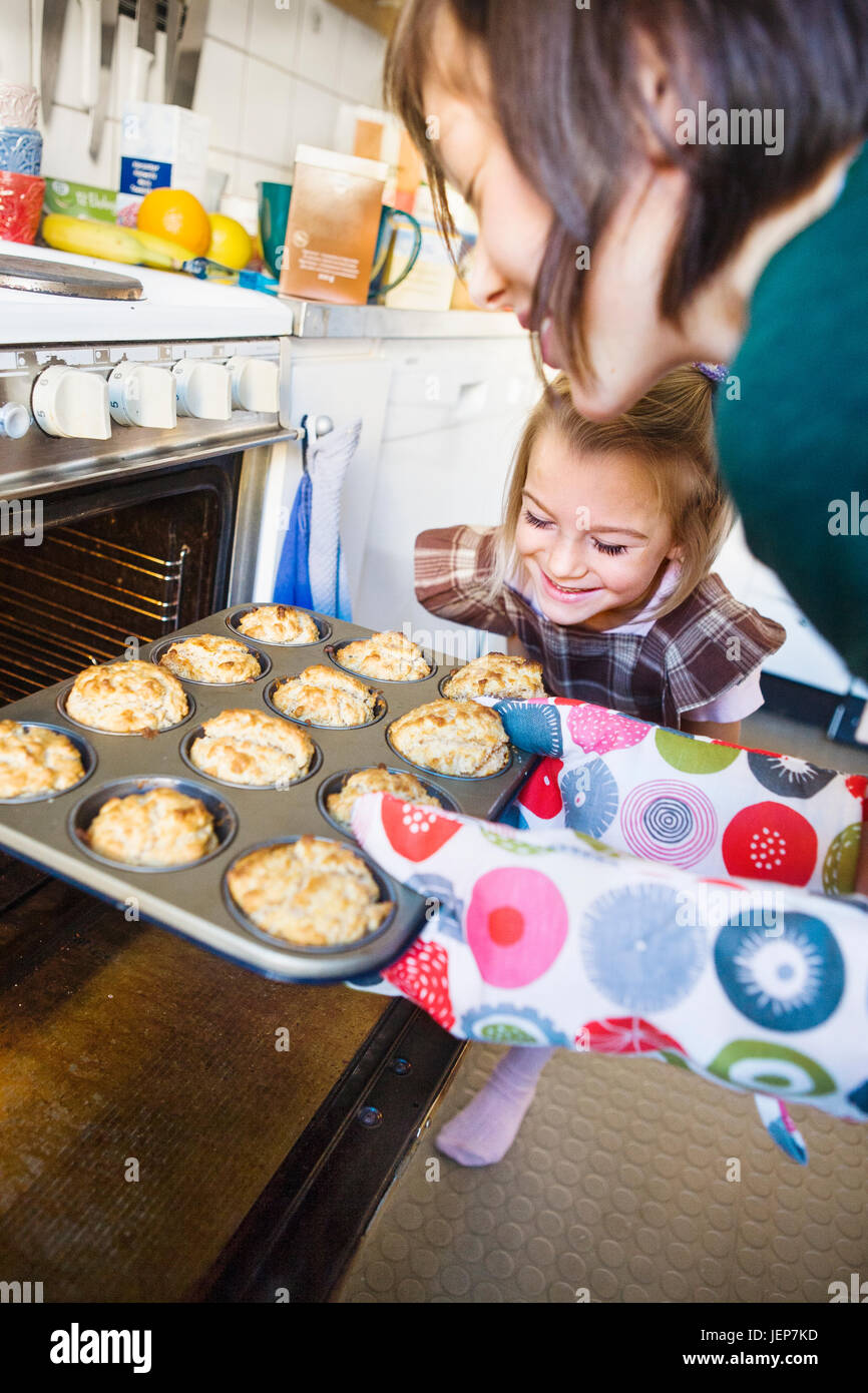 Two sisters cooking together hi-res stock photography and images - Alamy