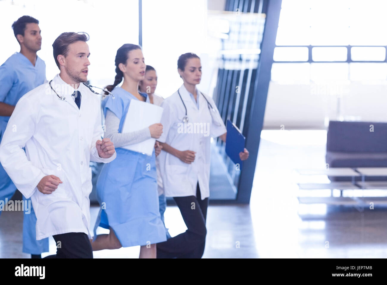Doctors and nurses rushing for emergency Stock Photo - Alamy