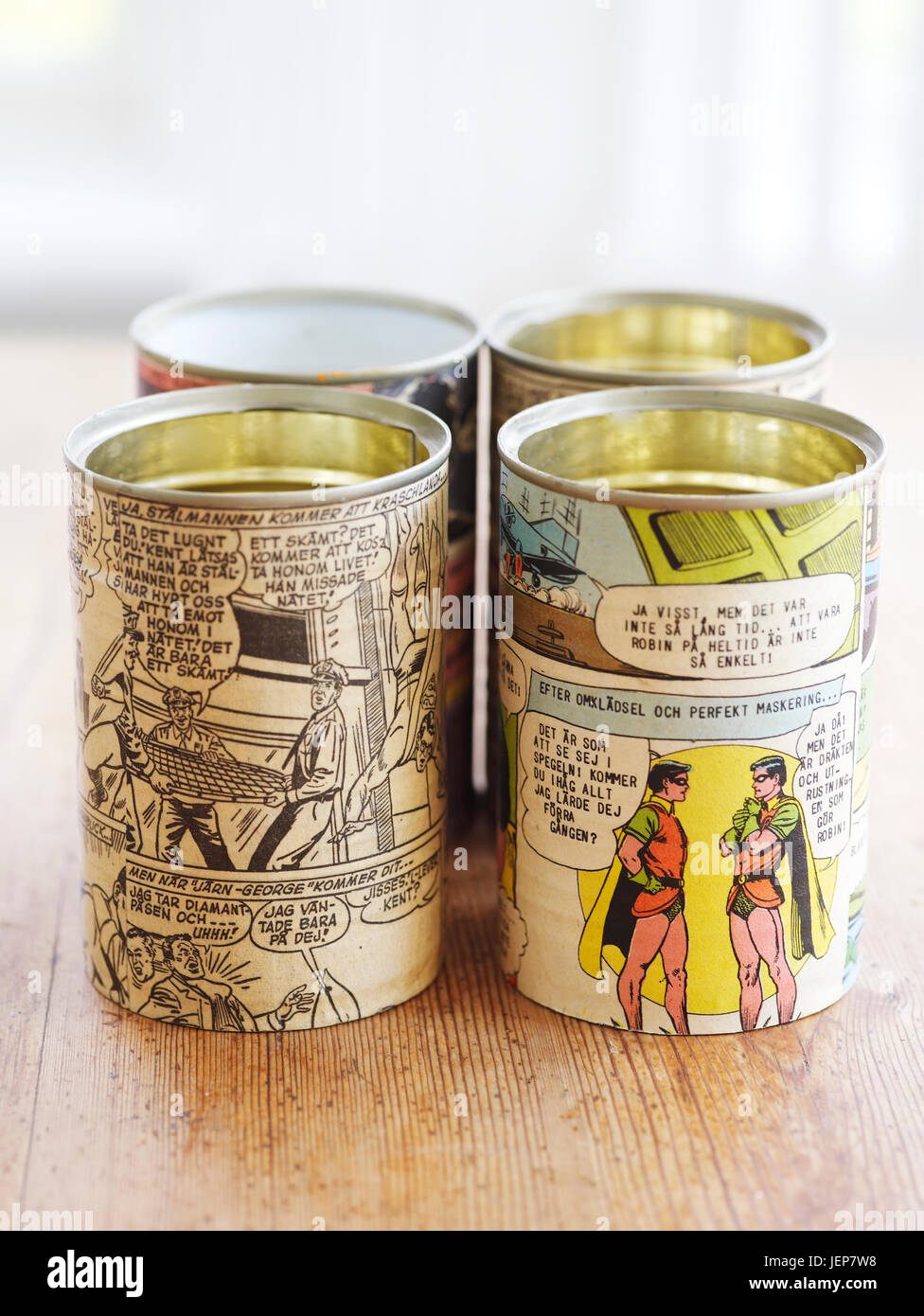Cartoon design on cans Stock Photo - Alamy