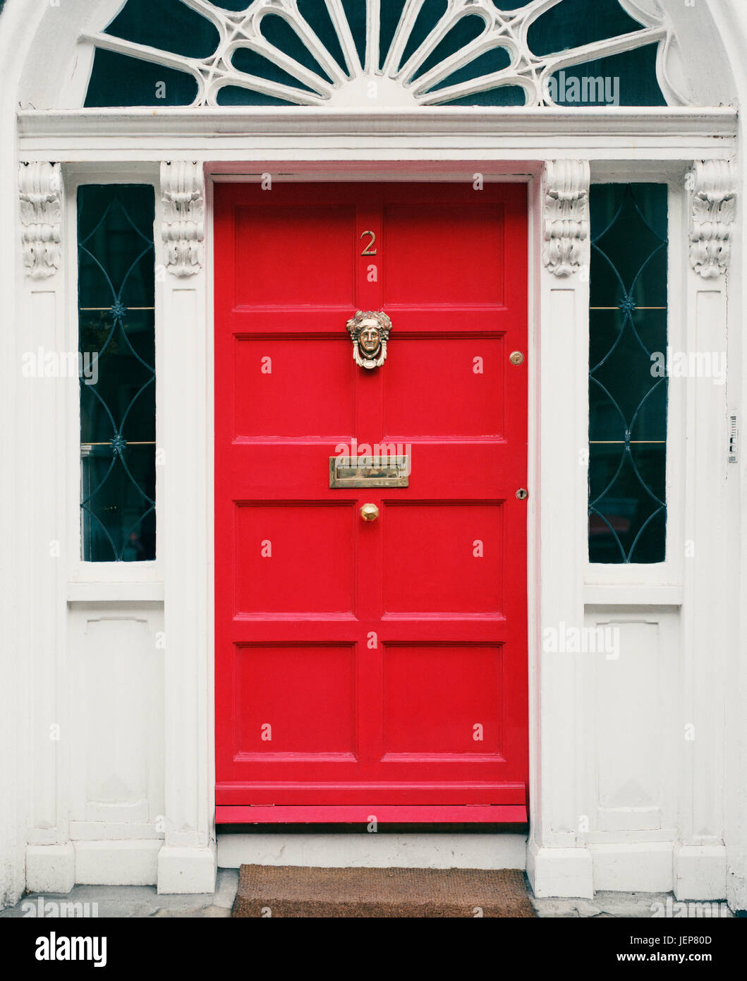 Red entrance door Stock Photo - Alamy