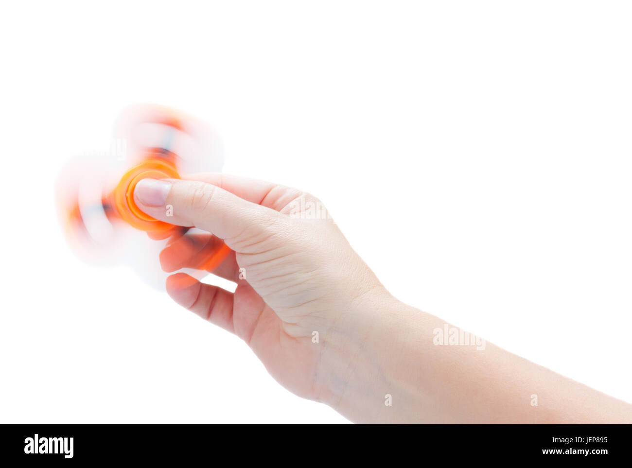 Hand holding spinning fidget spinner, popular relaxing toy, generic ...