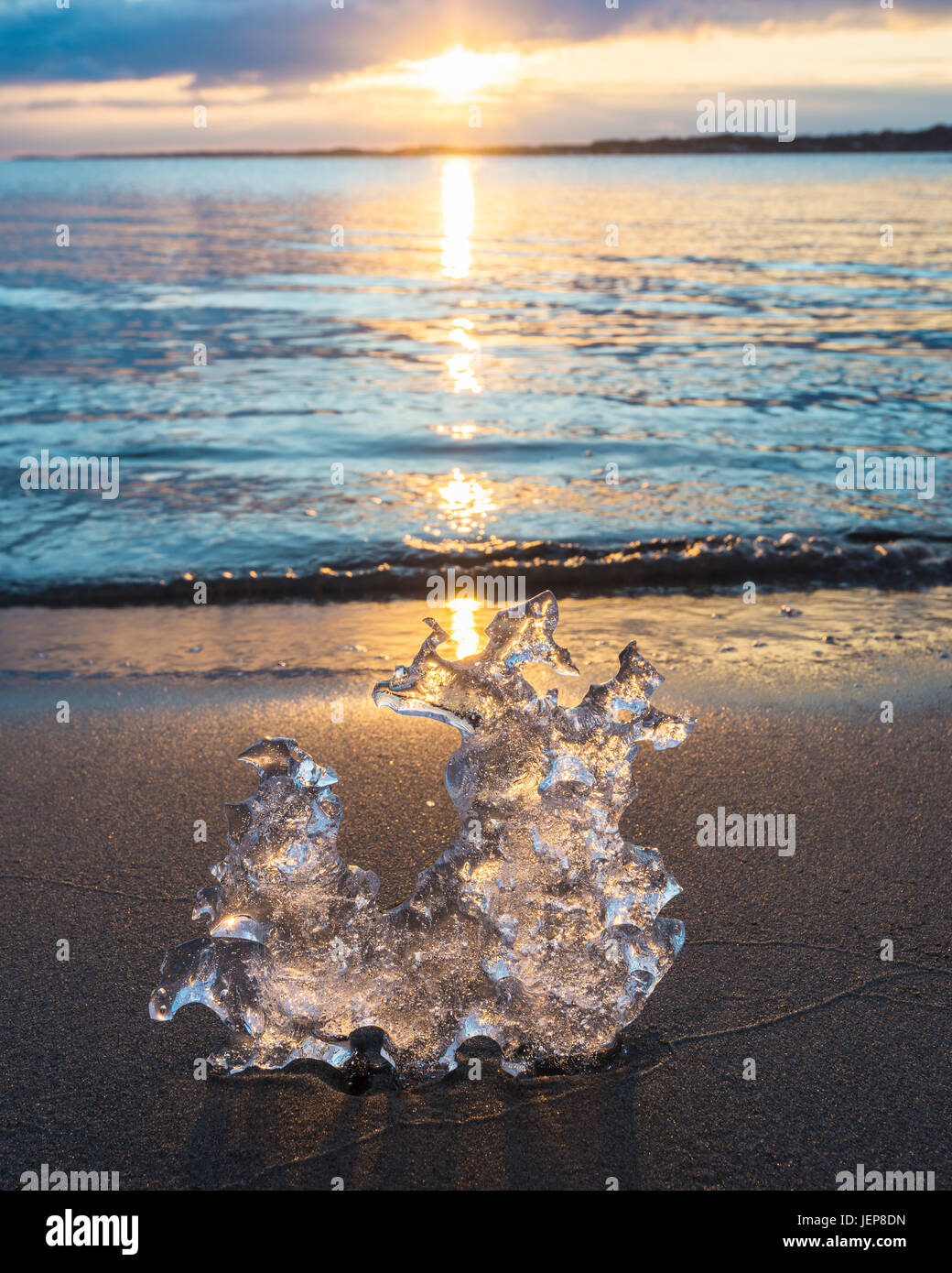 Ice on beach Stock Photo - Alamy