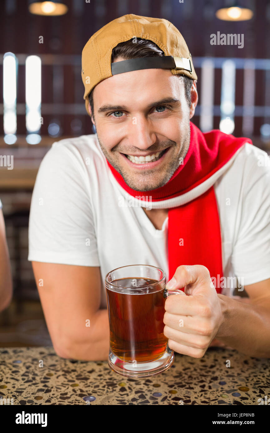 Man toasting a beer Stock Photo - Alamy
