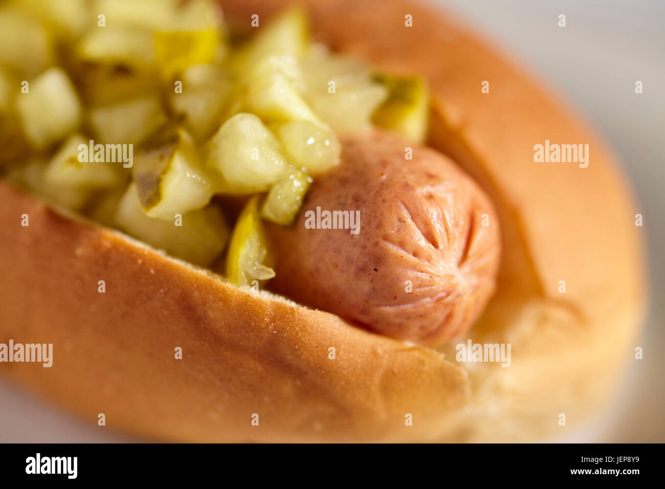 turkey hot dog served on a bun and topped with green pickle relish ...