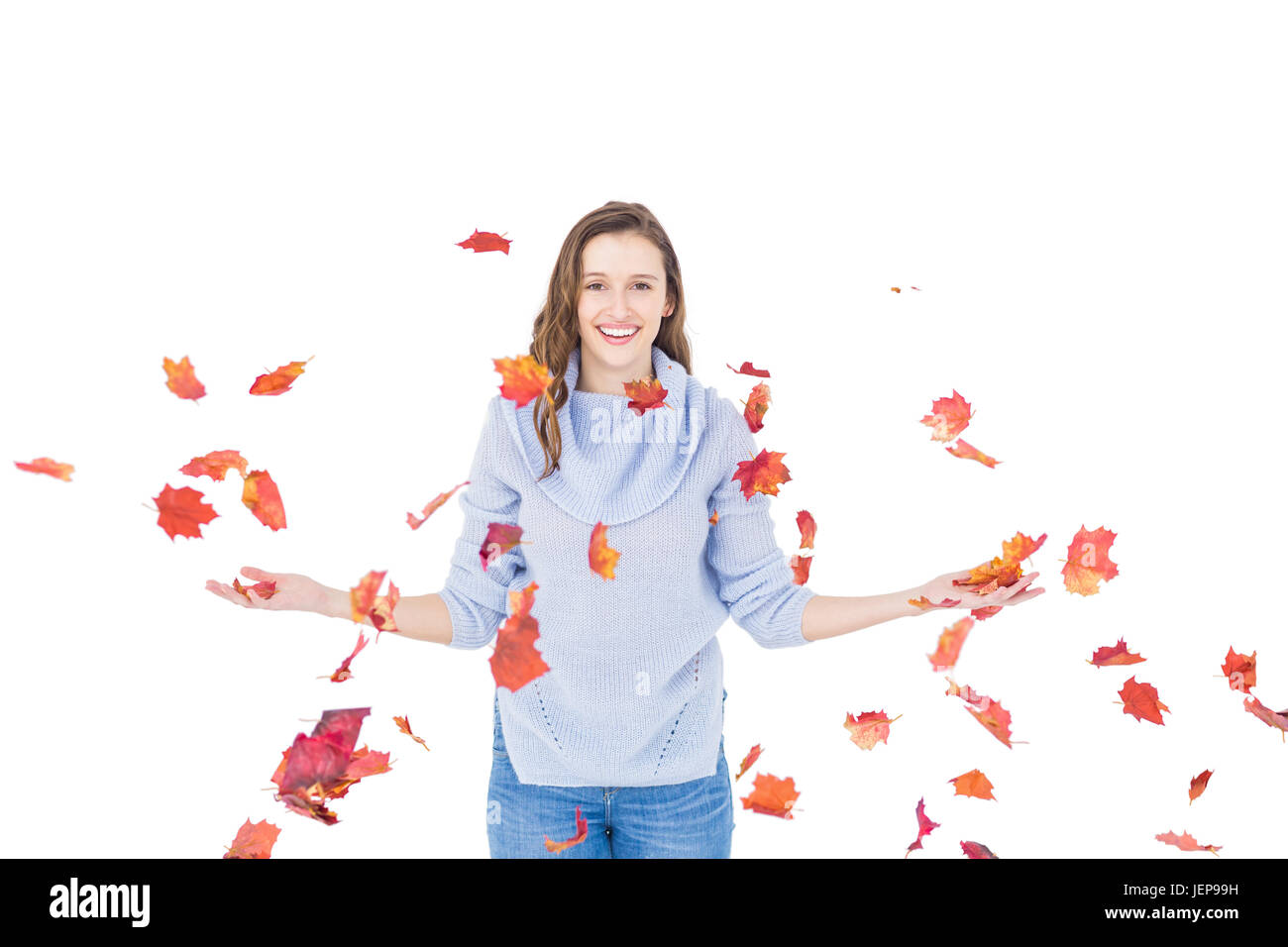 Happy woman throwing leaves Stock Photo - Alamy