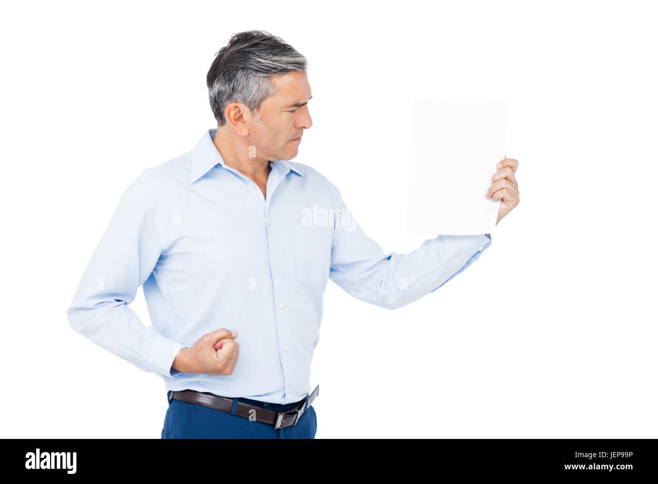 Angry man holding blank paper Stock Photo - Alamy