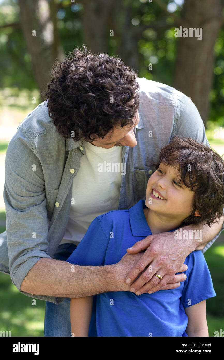 Father and son standing Stock Photo - Alamy