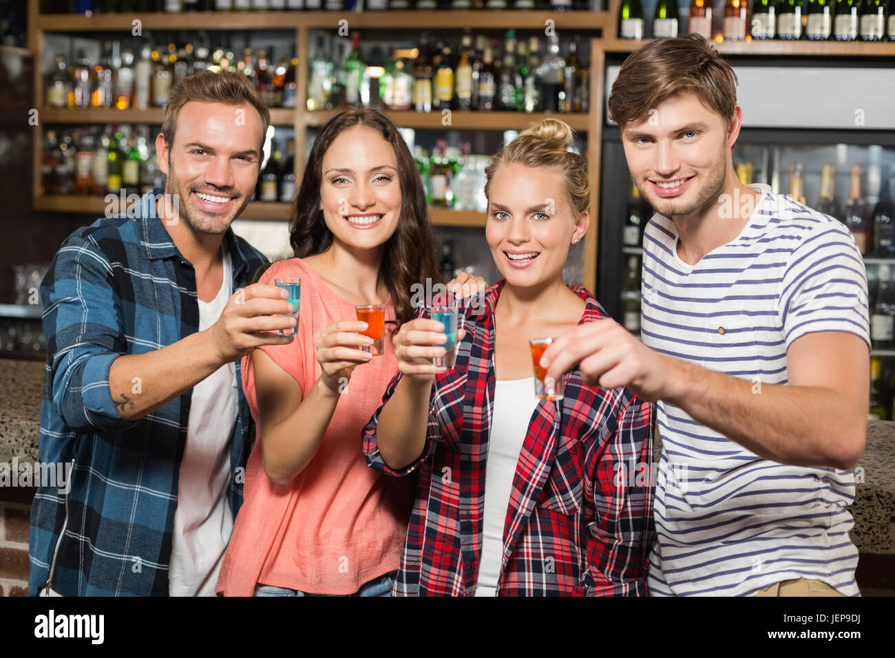 Toasting to shots hi-res stock photography and images - Alamy