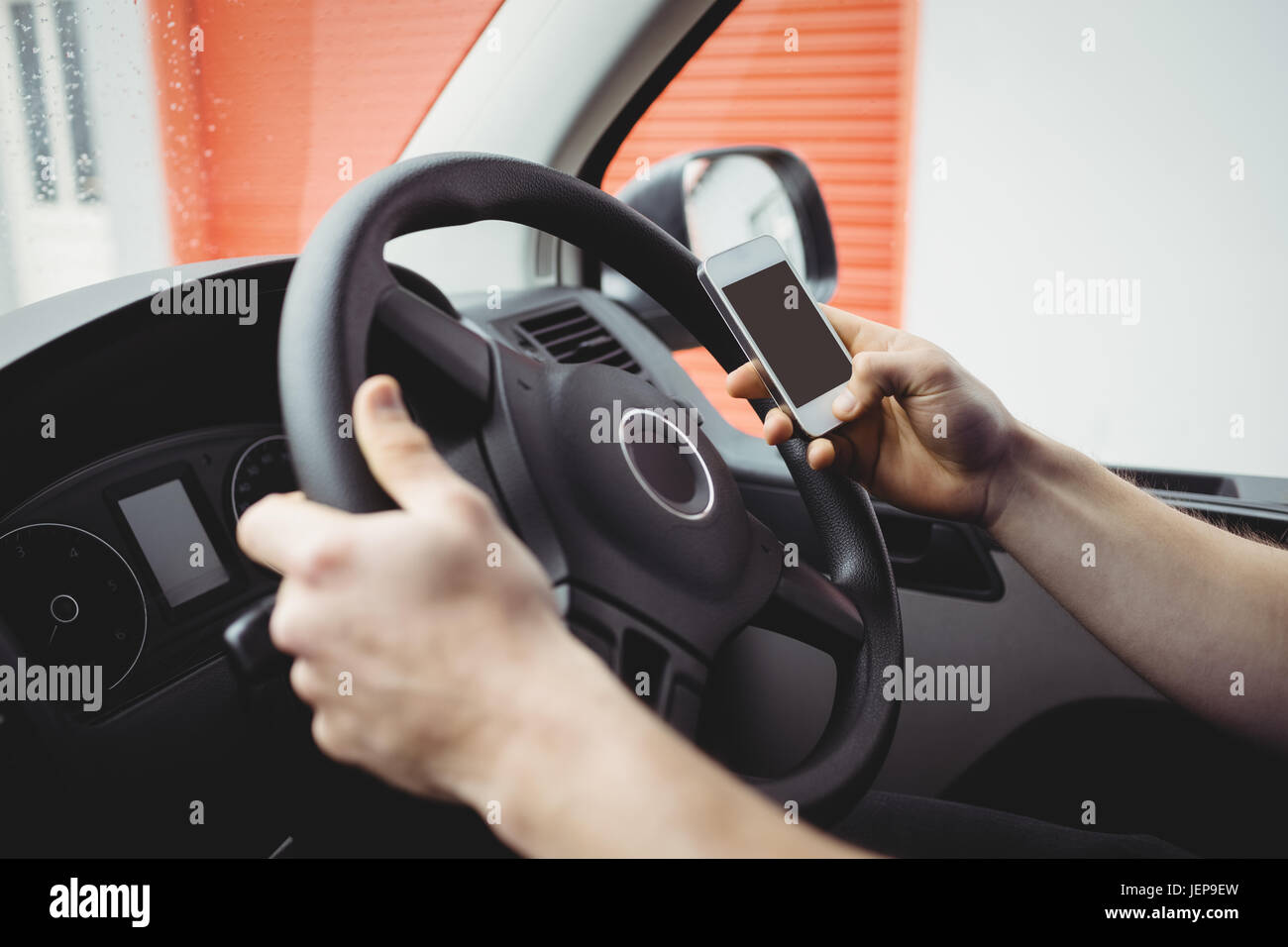 Delivery man driving his van Stock Photo - Alamy Delivery man driving his van Stock Photo - Alamy
