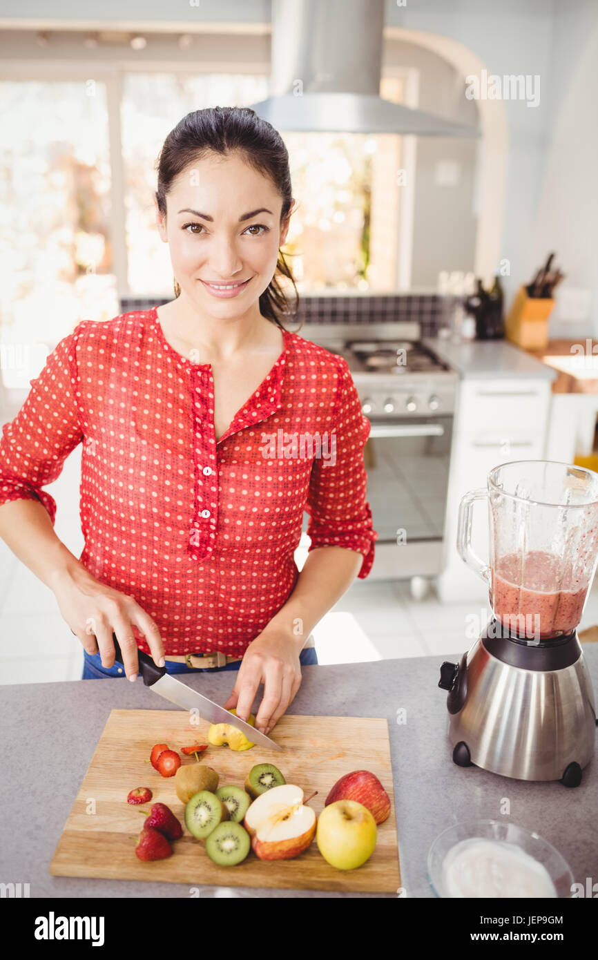 Mid adult woman with fruits hi-res stock photography and images - Alamy