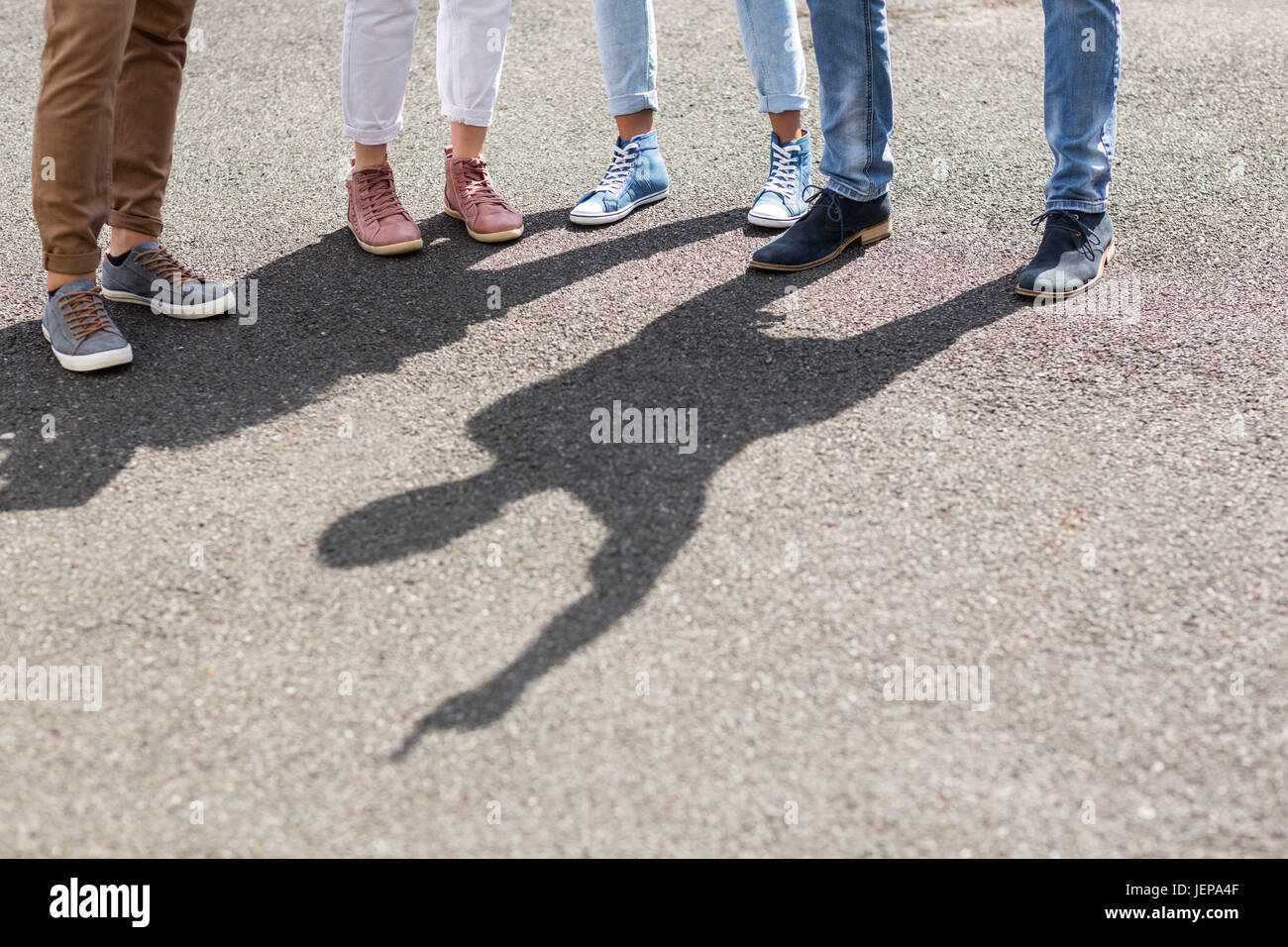 Lower section of friends Stock Photo - Alamy