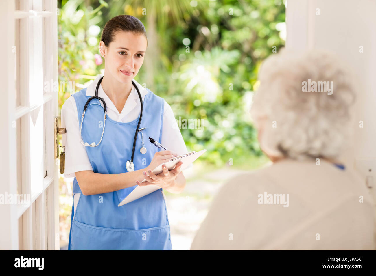 Doctor checking patients health Stock Photo - Alamy
