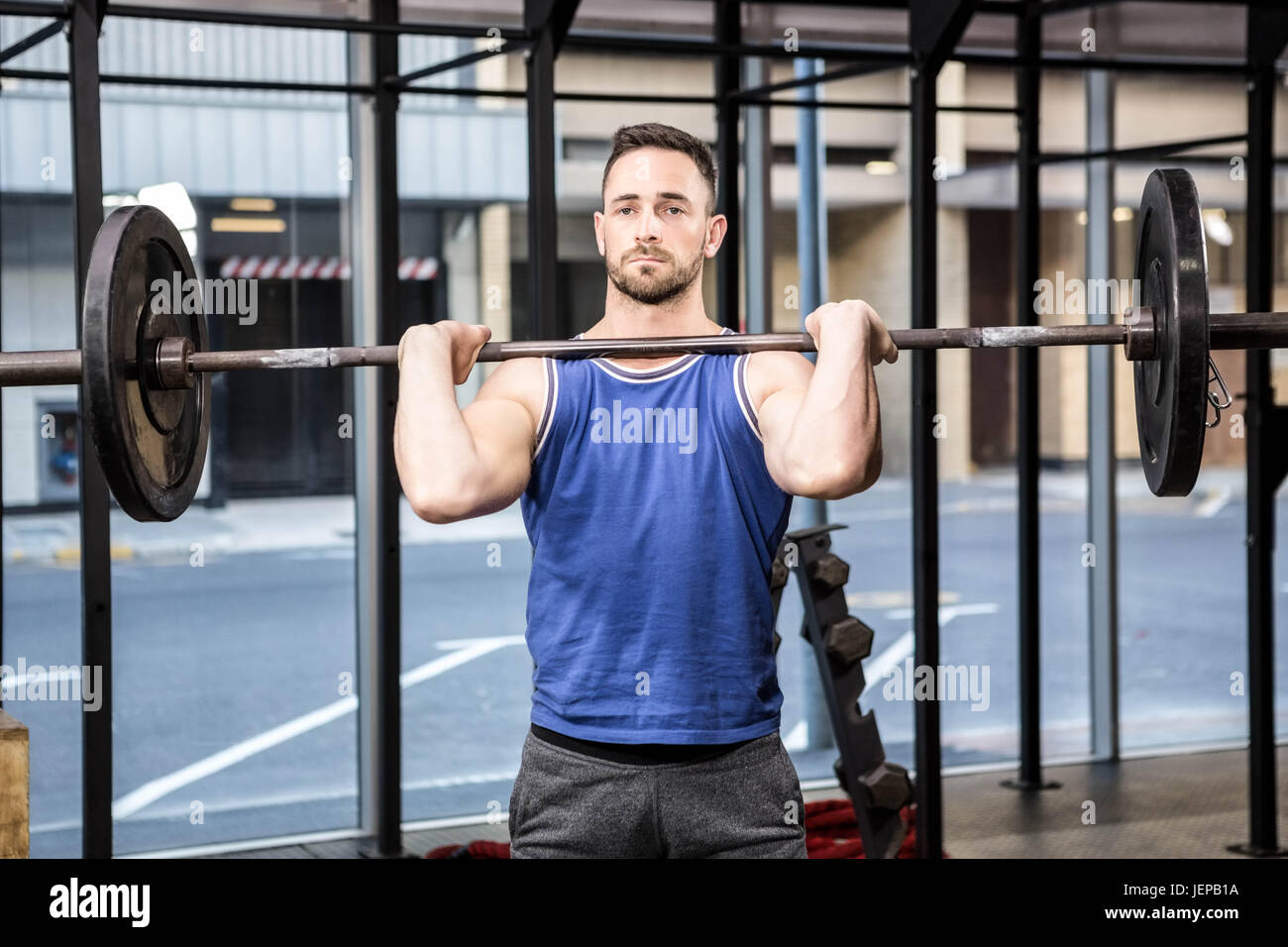 Athlete lifting barbell on bench hi-res stock photography and images ...