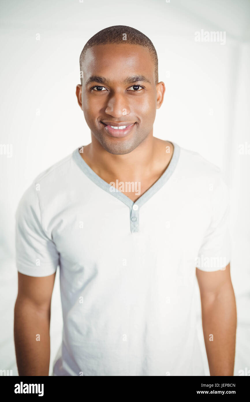 Portrait of smiling man standing Stock Photo - Alamy Portrait of smiling man standing Stock Photo - Alamy