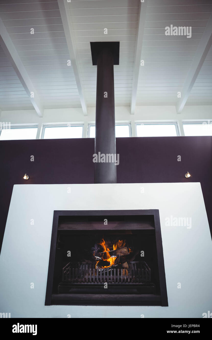 Fireplace set in wall Stock Photo - Alamy