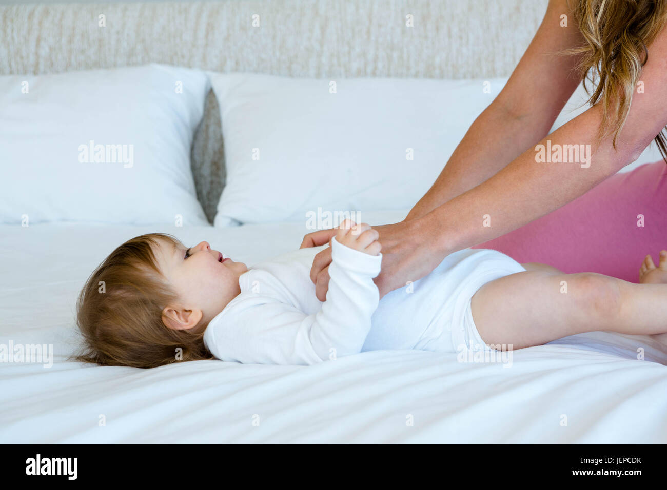 smiling baby being tickled Stock Photo - Alamy