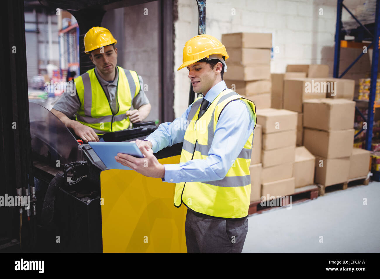 Warehouse forklift driver smiling hi-res stock photography and images ...