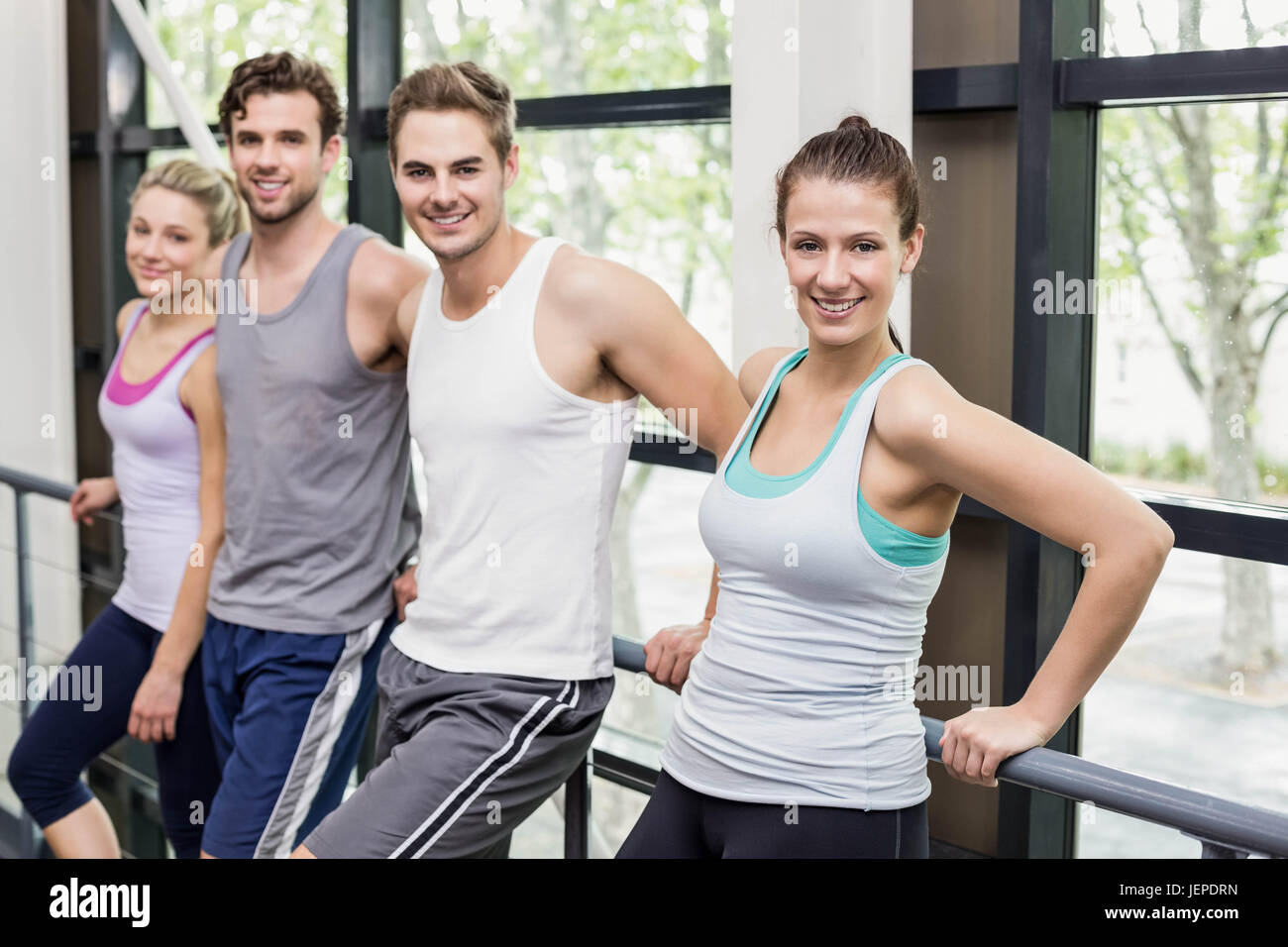 Fit people posing together Stock Photo - Alamy