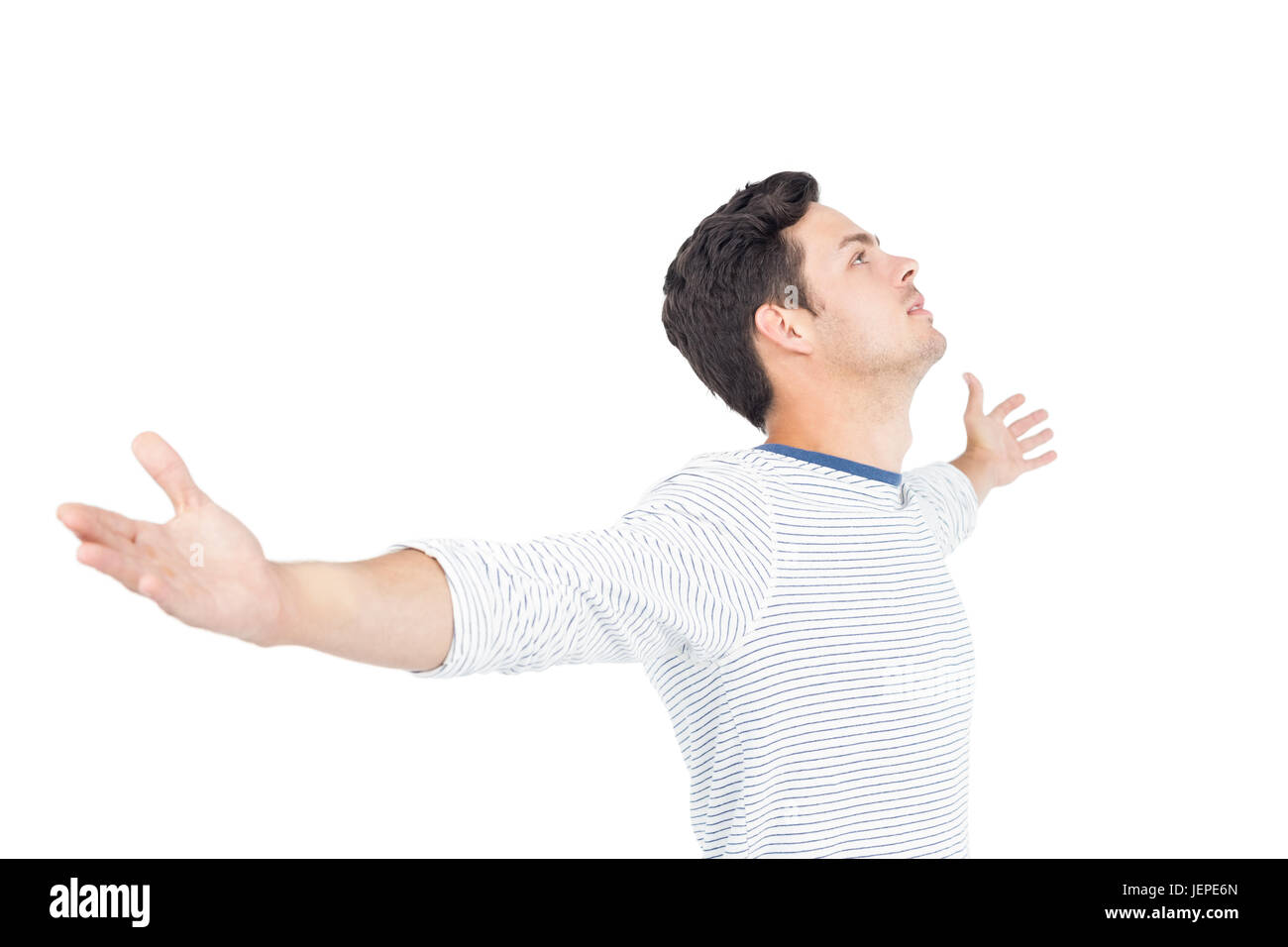 Thoughtful man with arm open Stock Photo - Alamy