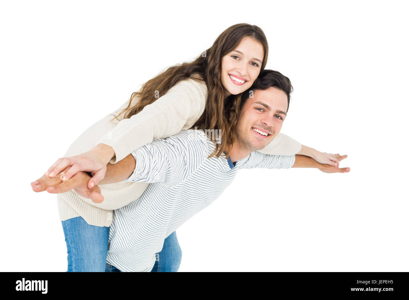 Couple piggy back happy Cut Out Stock Images & Pictures - Alamy