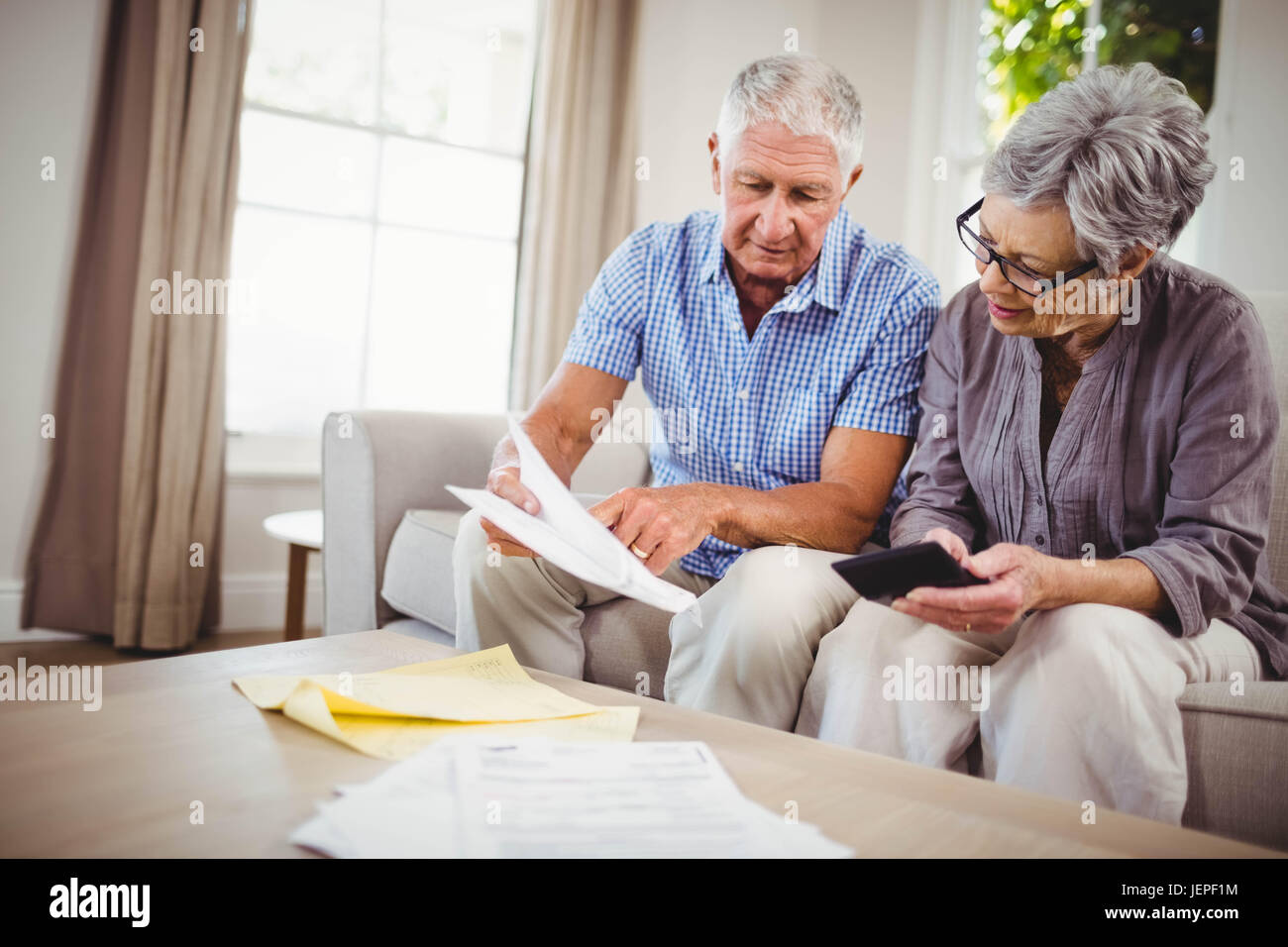 Man Woman Elderly Documents High Resolution Stock Photography and ...