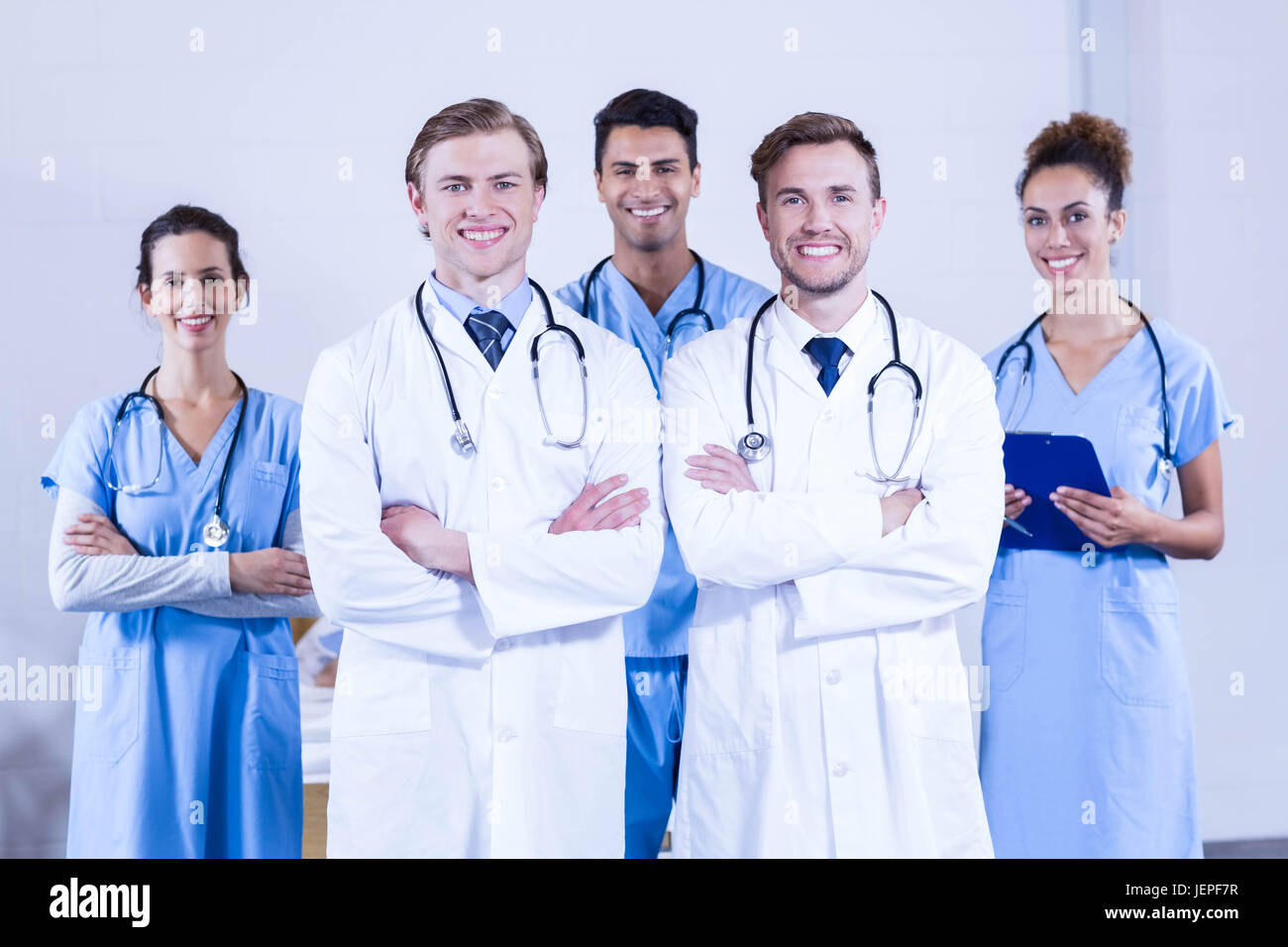 Portrait of medical team standing together Stock Photo - Alamy