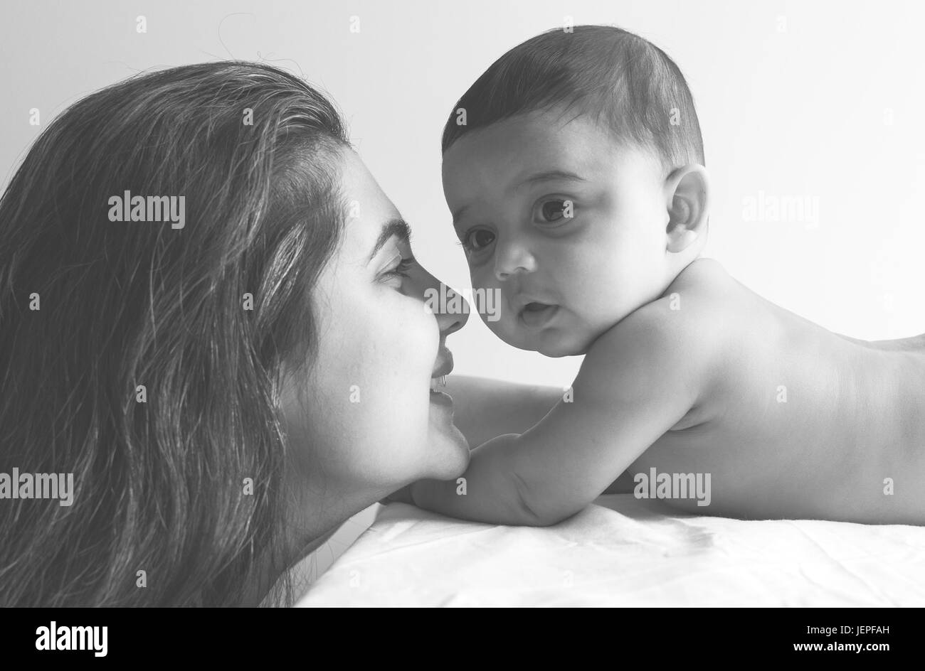 Model released photograph of a mother and her son having a playful time ...