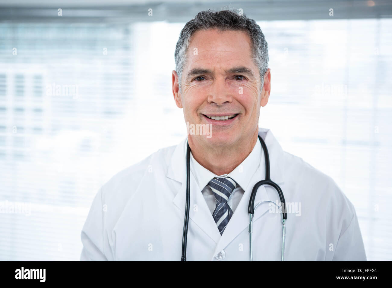 Portrait of confident doctor Stock Photo - Alamy