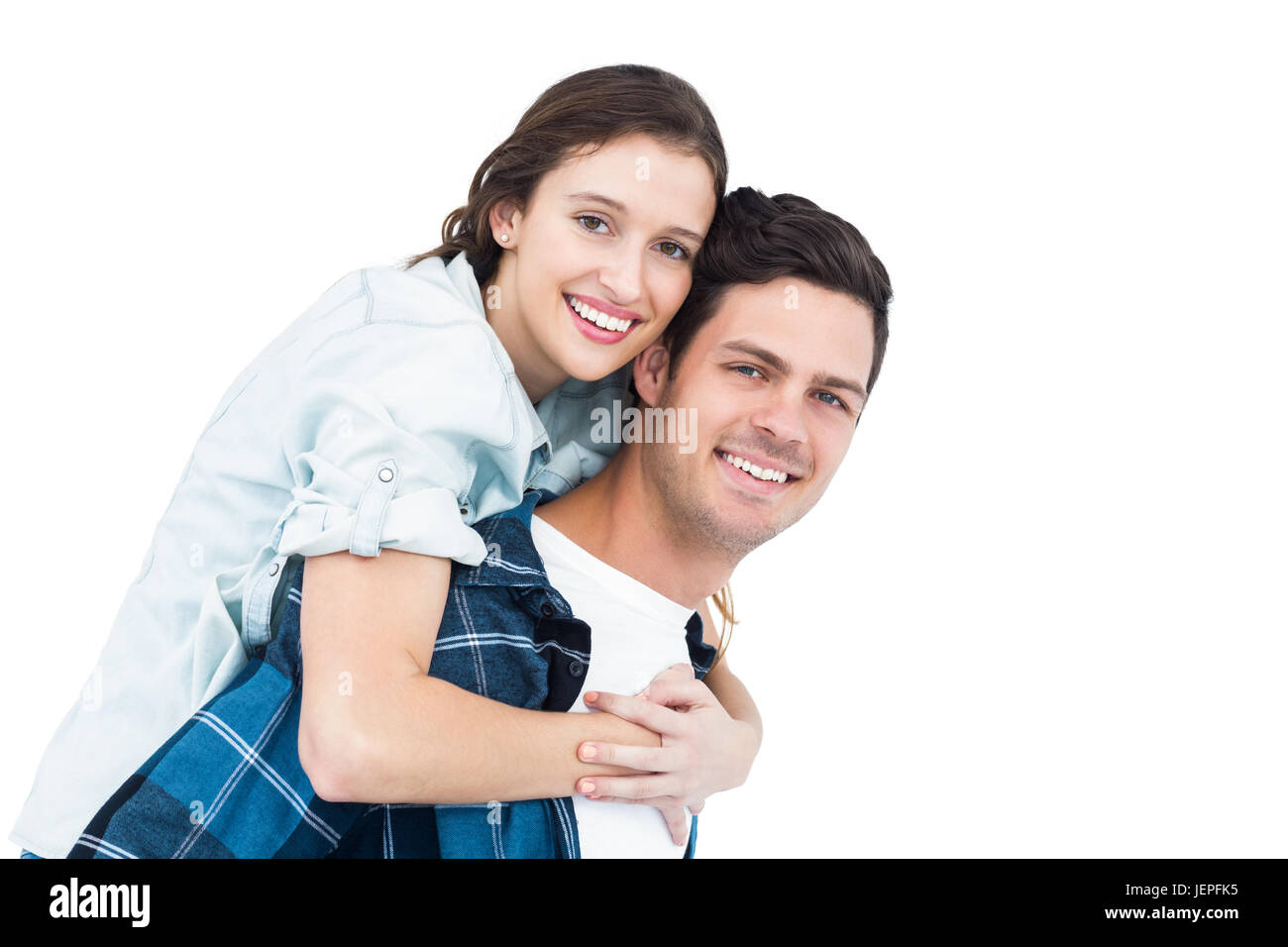 Cute couple embracing and looking the camera Stock Photo - Alamy