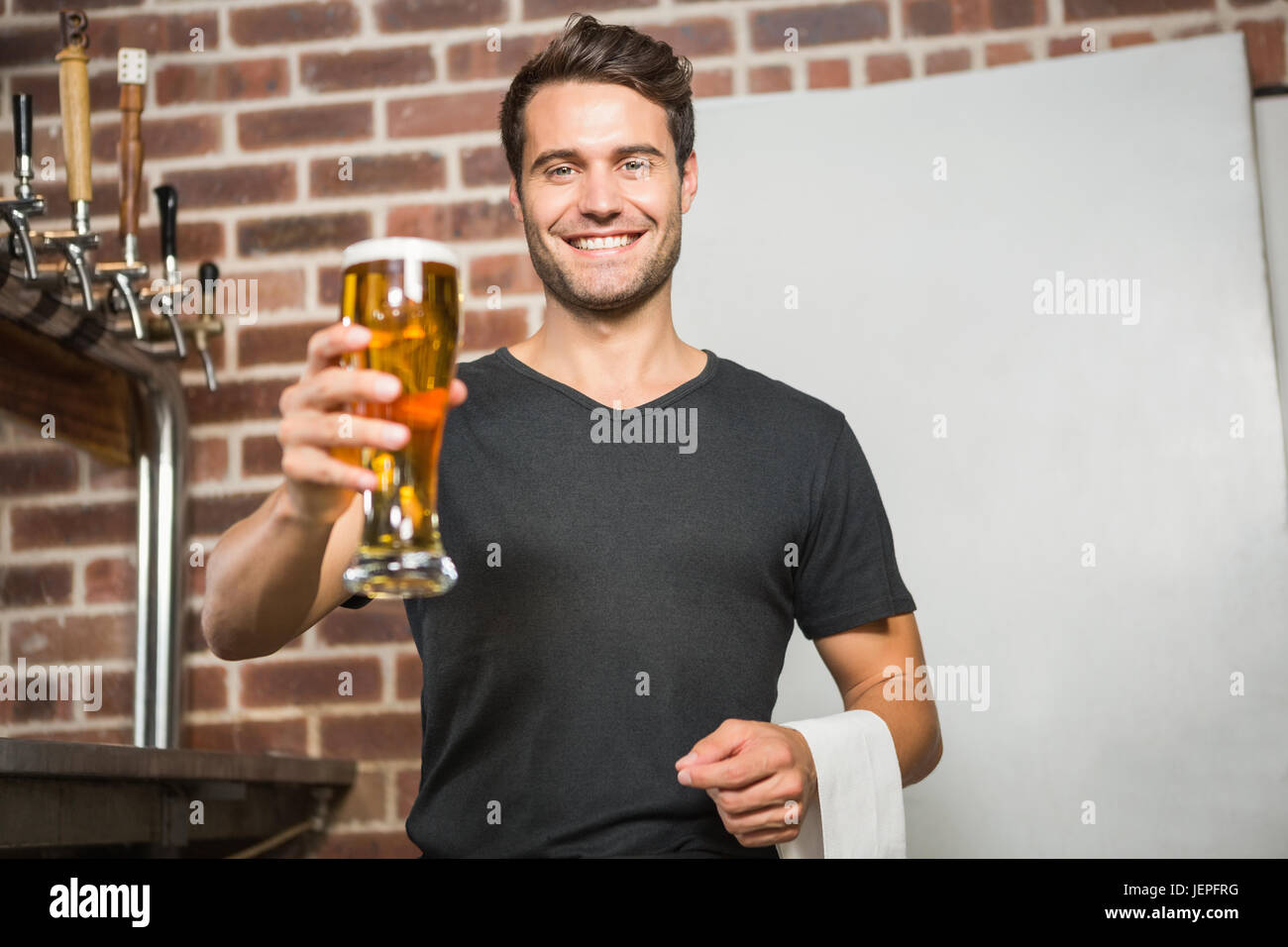 Man standing bar pint hi-res stock photography and images - Alamy