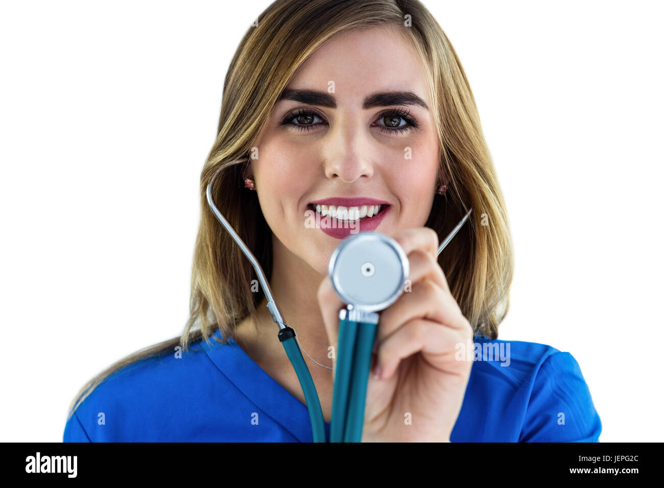 Smiling nurse using stethoscope Stock Photo - Alamy