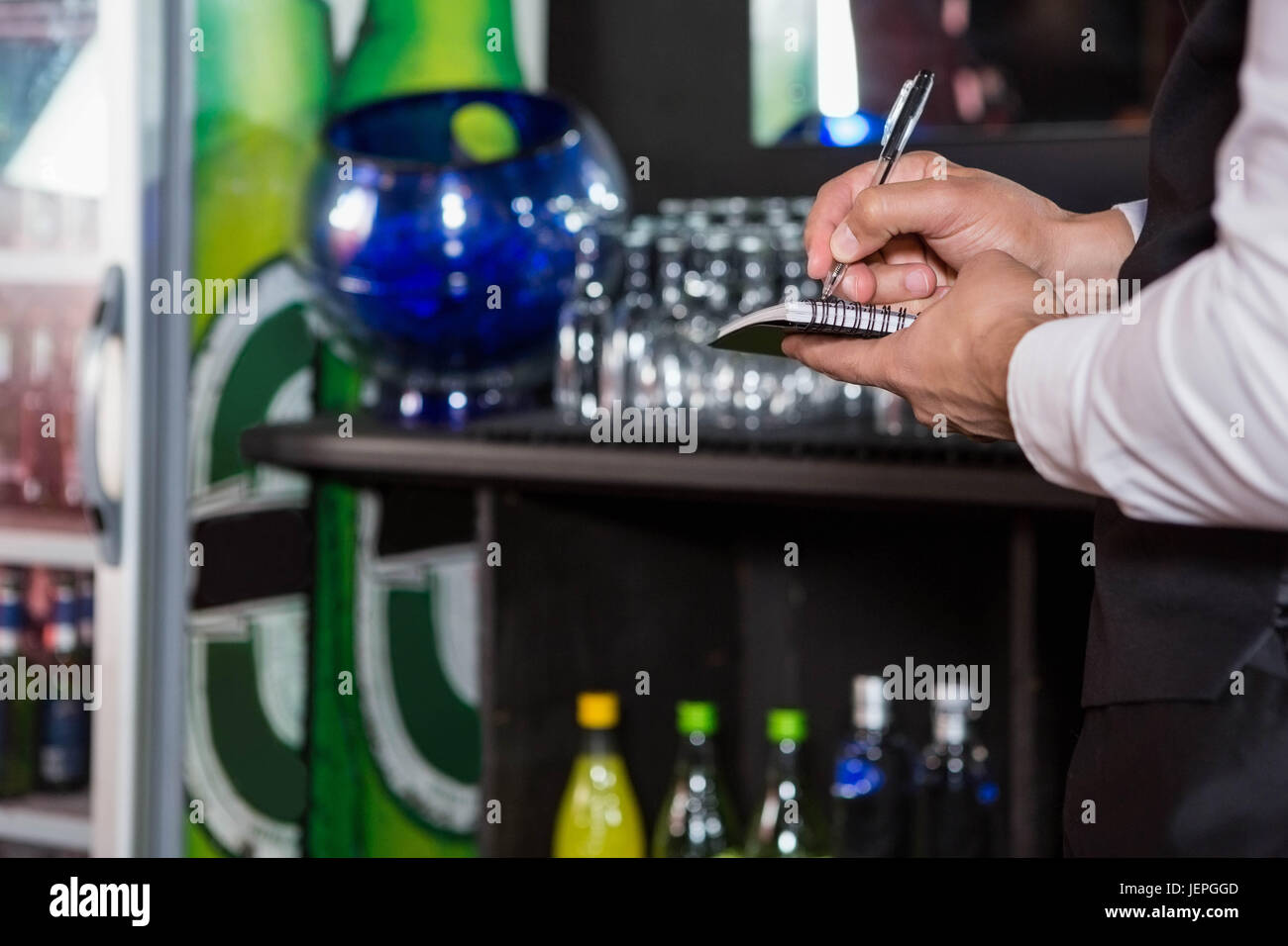 Waiter writing down an order hi-res stock photography and images - Alamy