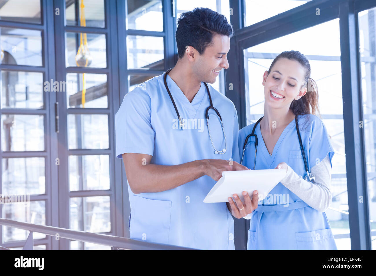 Medical team talking at the hospital Stock Photo - Alamy