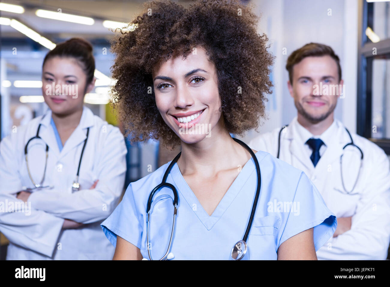 Medical team standing close hospital hi-res stock photography and ...