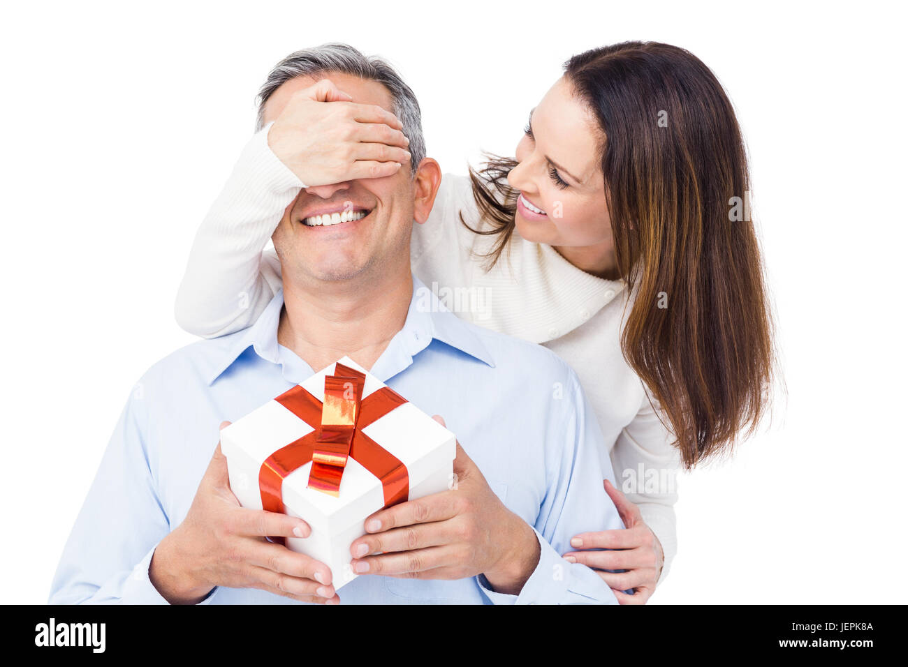 Cute couple holding box Stock Photo - Alamy