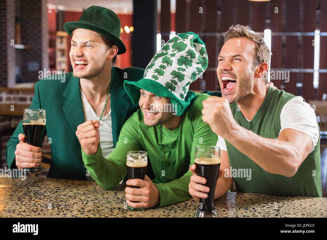 Men watching a game on tv Stock Photo - Alamy