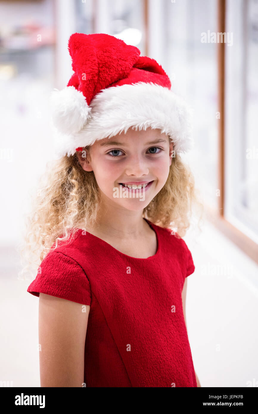 Portrait of a girl in Christmas attire Stock Photo - Alamy