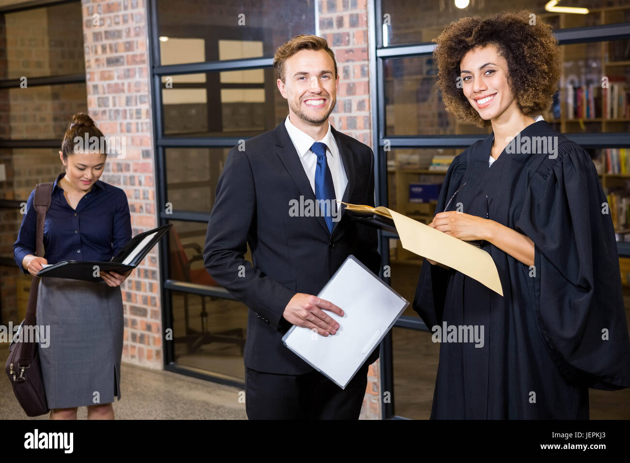 Lawyer looking at documents Stock Photo - Alamy