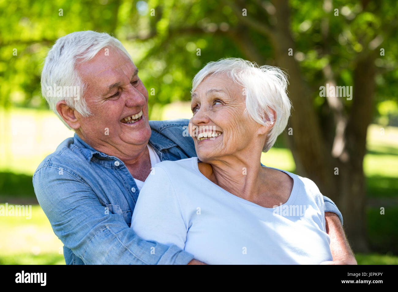 Senior couple smiling together Stock Photo - Alamy