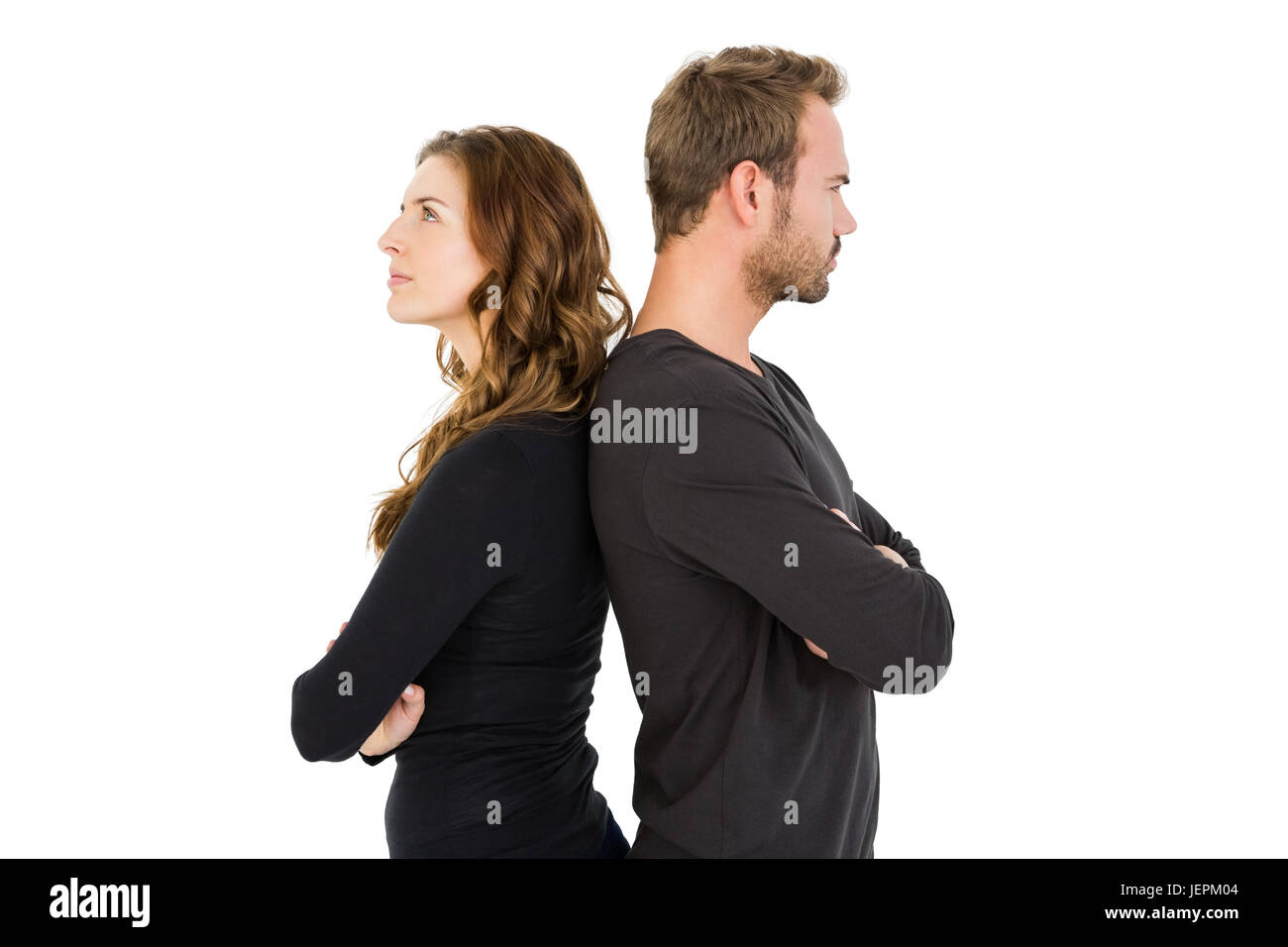 Depressed couple standing back to back Stock Photo - Alamy