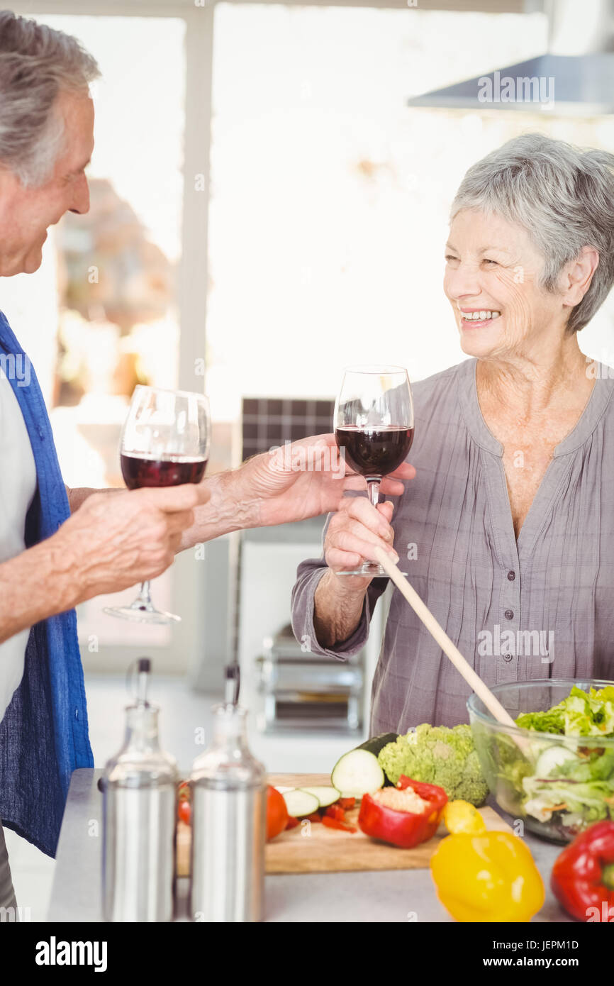 Man offering glass red wine hi-res stock photography and images - Alamy