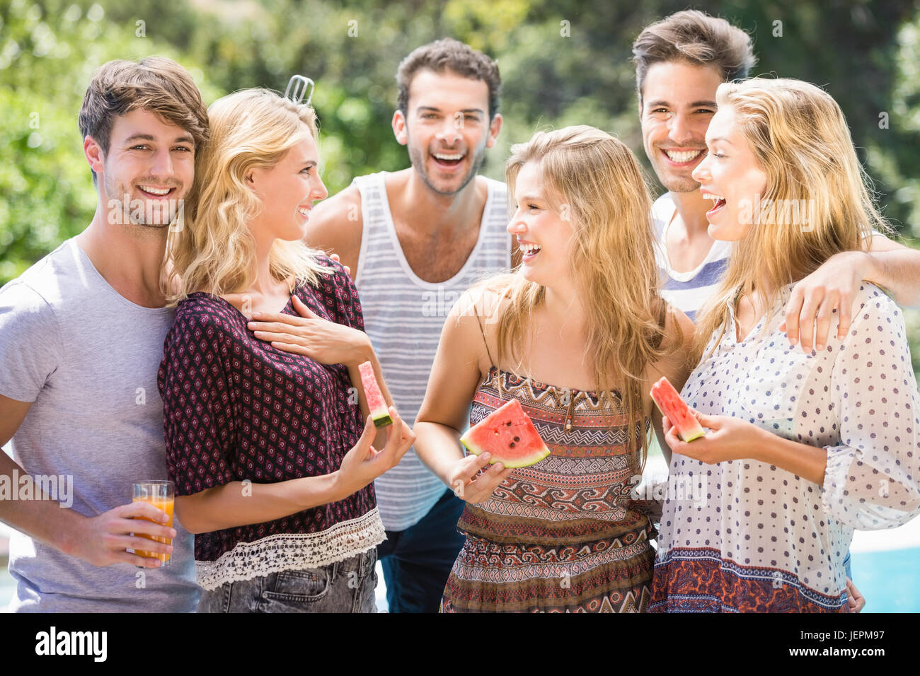 Group of friends having fun outdoors Stock Photo - Alamy
