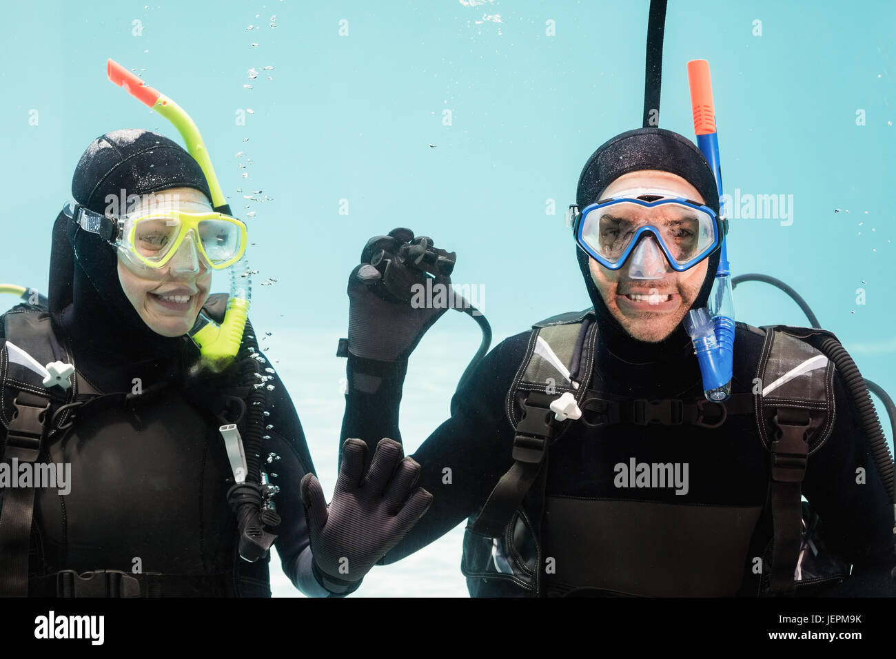 Couple practicing scuba diving together Stock Photo - Alamy